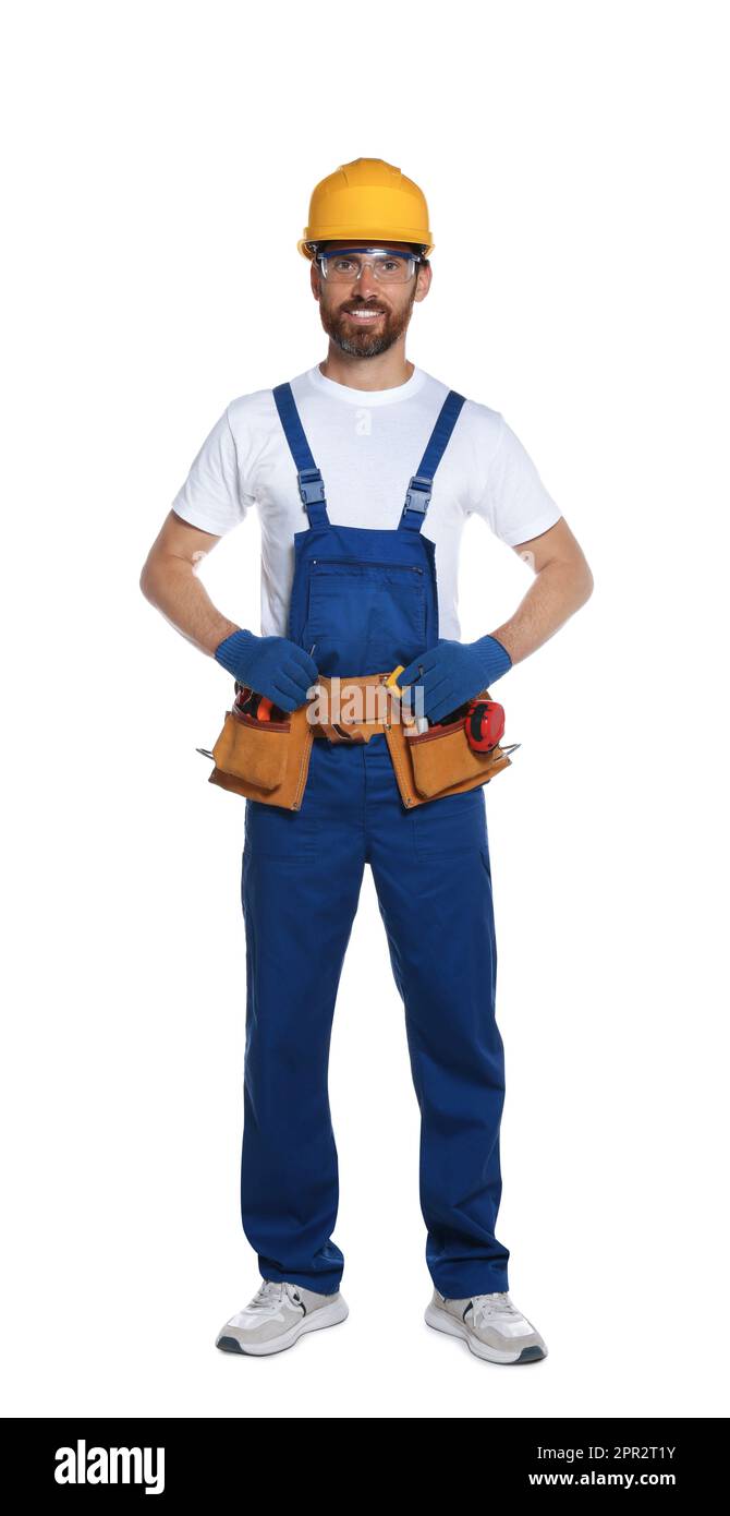 Professional builder in uniform with tool belt isolated on white Stock ...