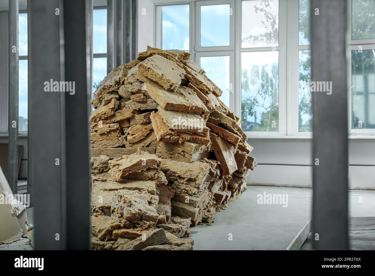 Heap of thermal insulation material in room Stock Photo - Alamy