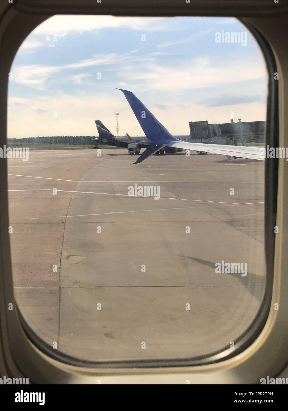 Airplane wing with beautiful sky from airplane window Stock Photo - Alamy