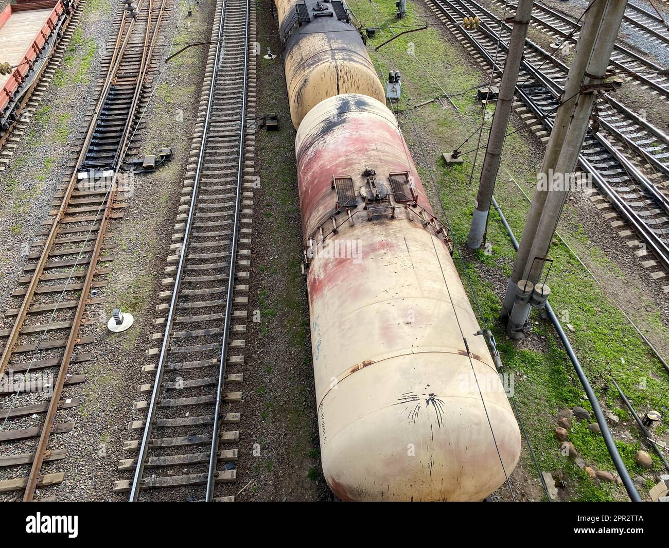 Top view of different railway wagons and tanks on an industrial ...