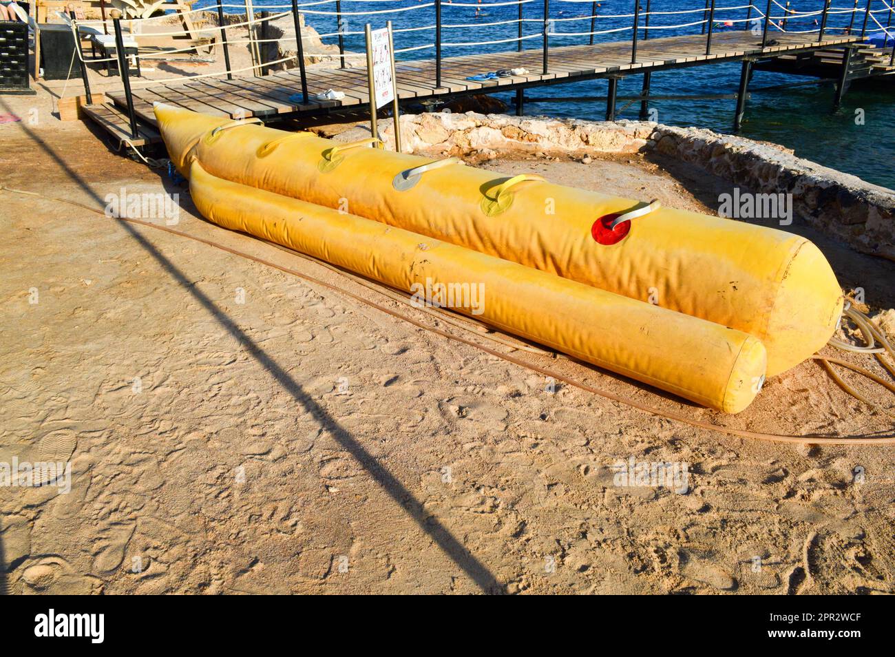 Inflatable yellow boat in the form of a banana for the entertainment of ...
