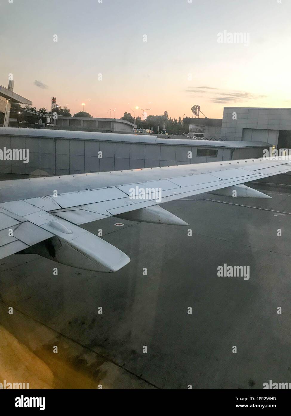 View of the airport, hangars from the porthole, the windows of the ...