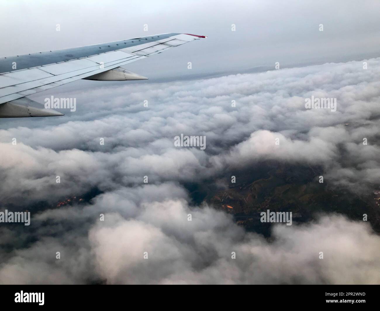Top view of the earth from the porthole, the windows of the aircraft on ...