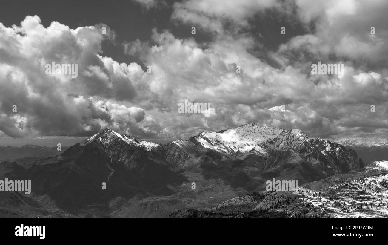 The Grigne mountains above the city of lecco Italy in black and white ...
