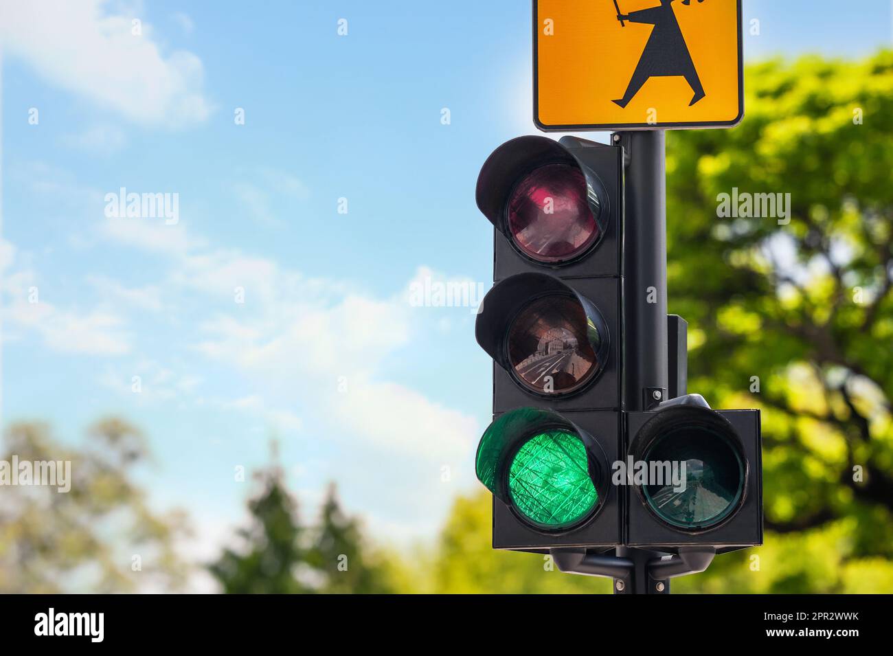 Traffic light against blue sky, space for text Stock Photo - Alamy