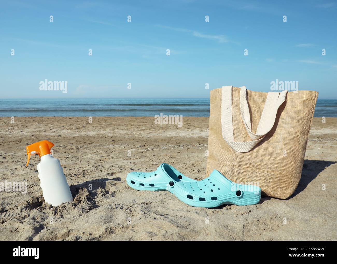 Shoes on sandy beach sunny hi-res stock photography and images - Alamy