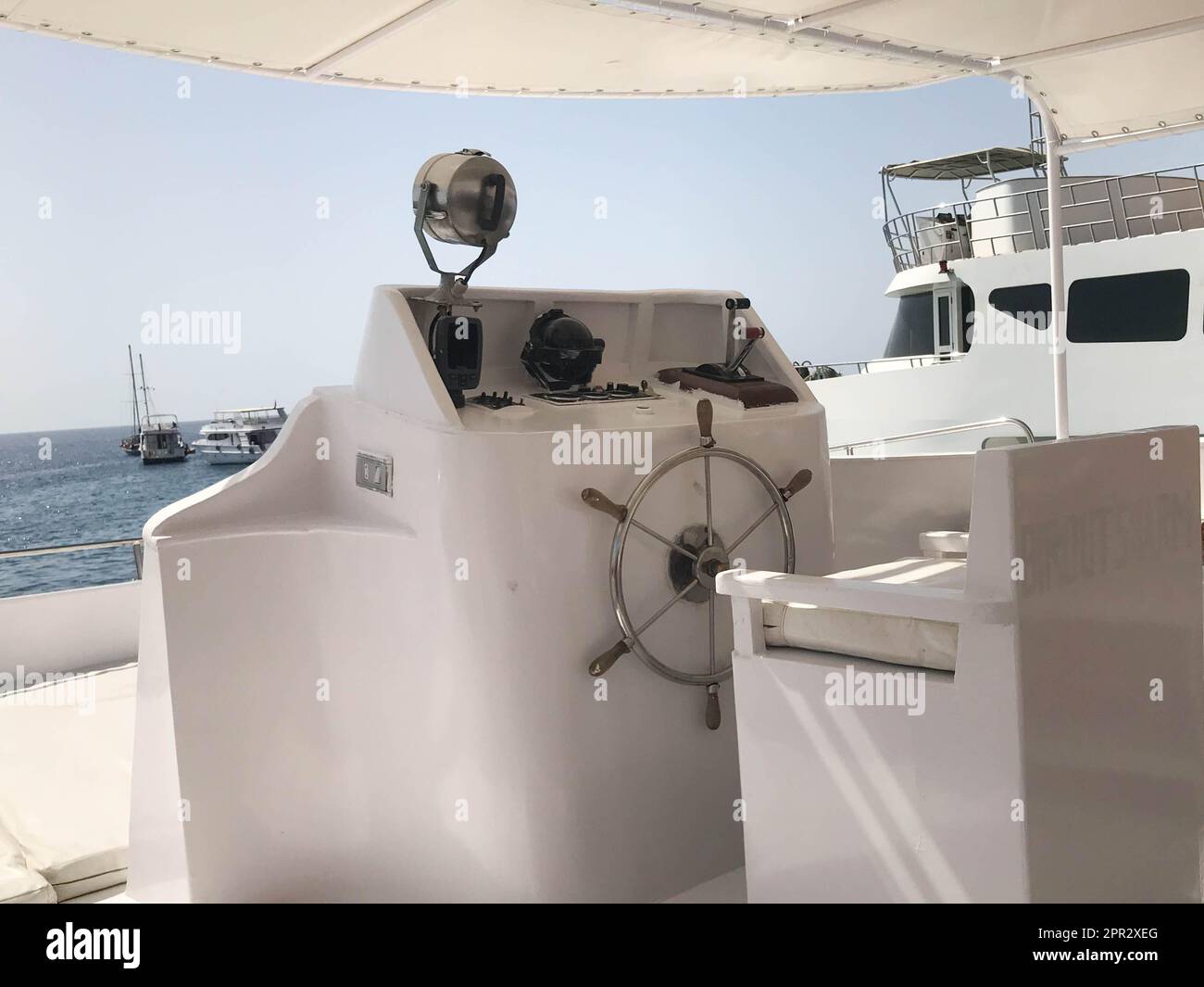Captain's cabin on a ship, boat, cruise liner with a steering wheel and ...