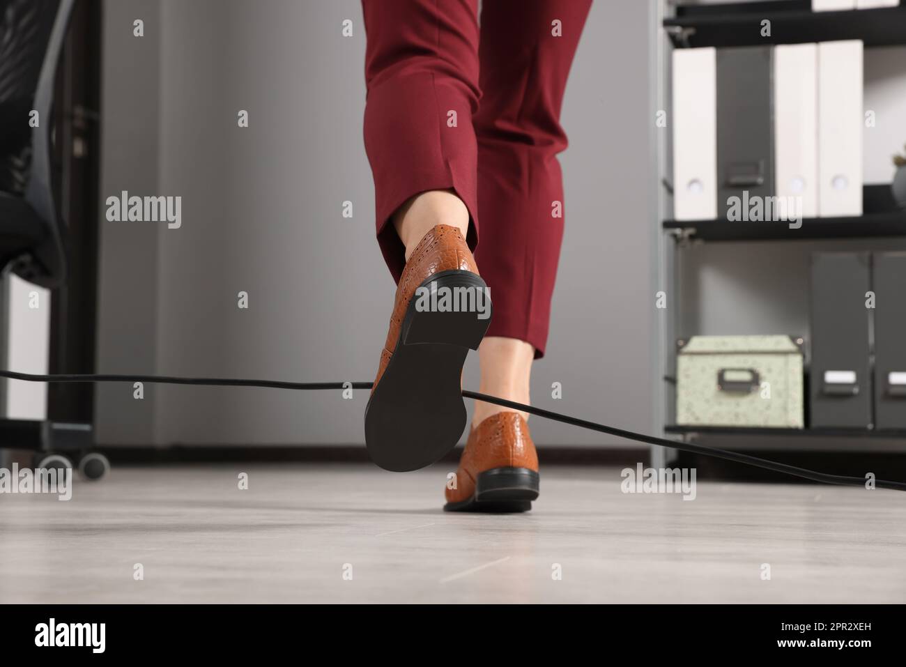 Tripping hazard office hi-res stock photography and images - Alamy