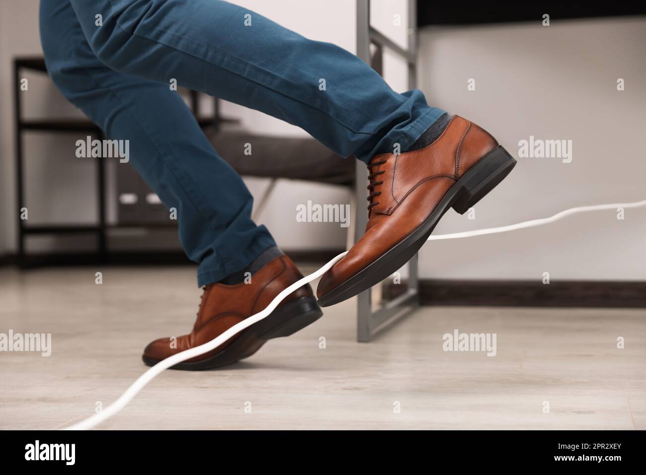 Tripping over wire hi-res stock photography and images - Alamy