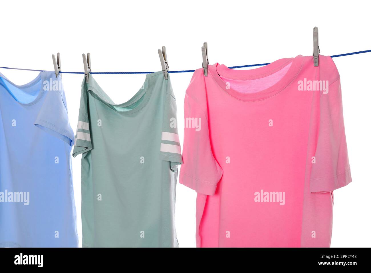 Different clothes drying on washing line against white background Stock ...