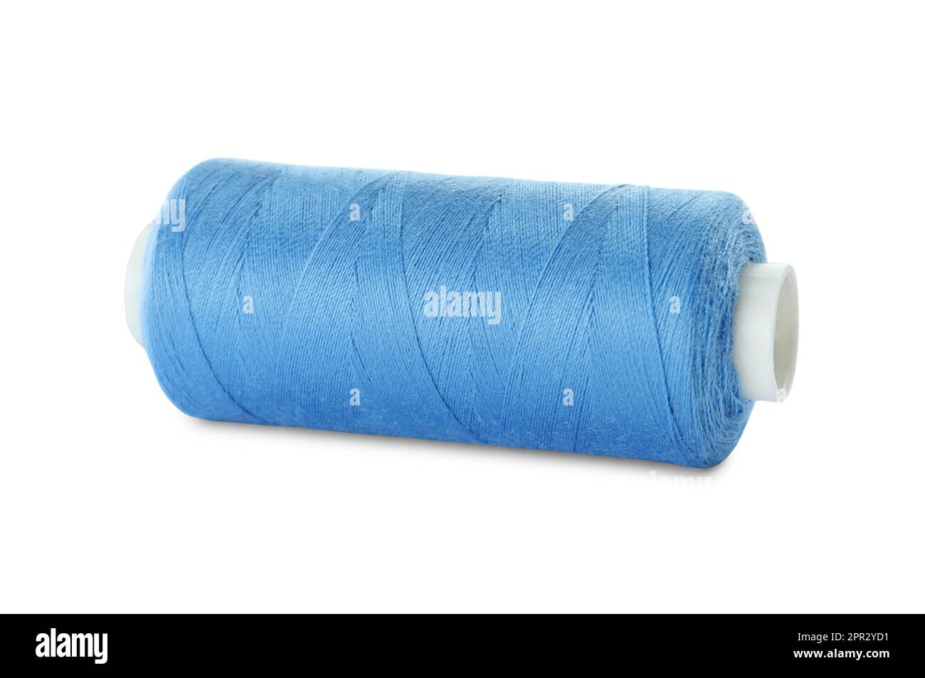 Spool of light blue sewing thread isolated on white Stock Photo - Alamy