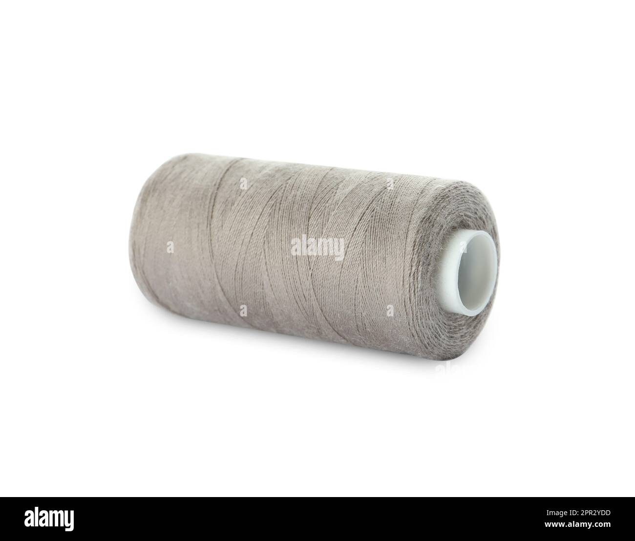 Spool of light grey sewing thread isolated on white Stock Photo - Alamy