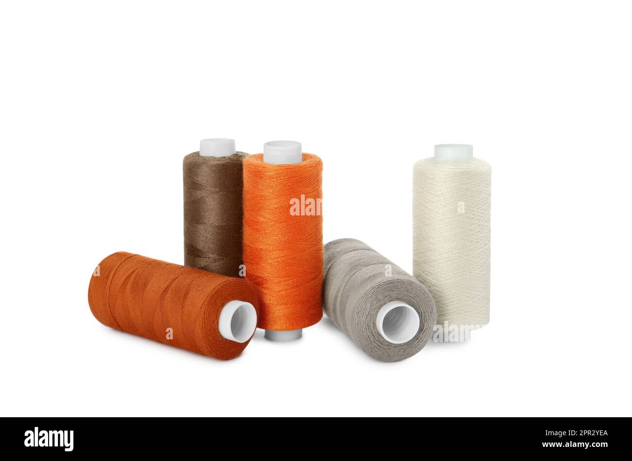Many different colorful sewing threads on white background Stock Photo ...