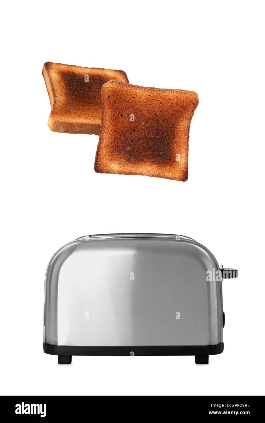 Roasted bread popping up of toaster on white background Stock Photo - Alamy