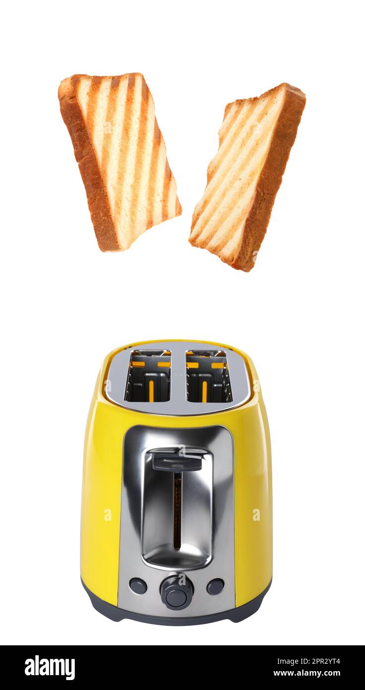 Roasted bread popping up of toaster on white background Stock Photo - Alamy