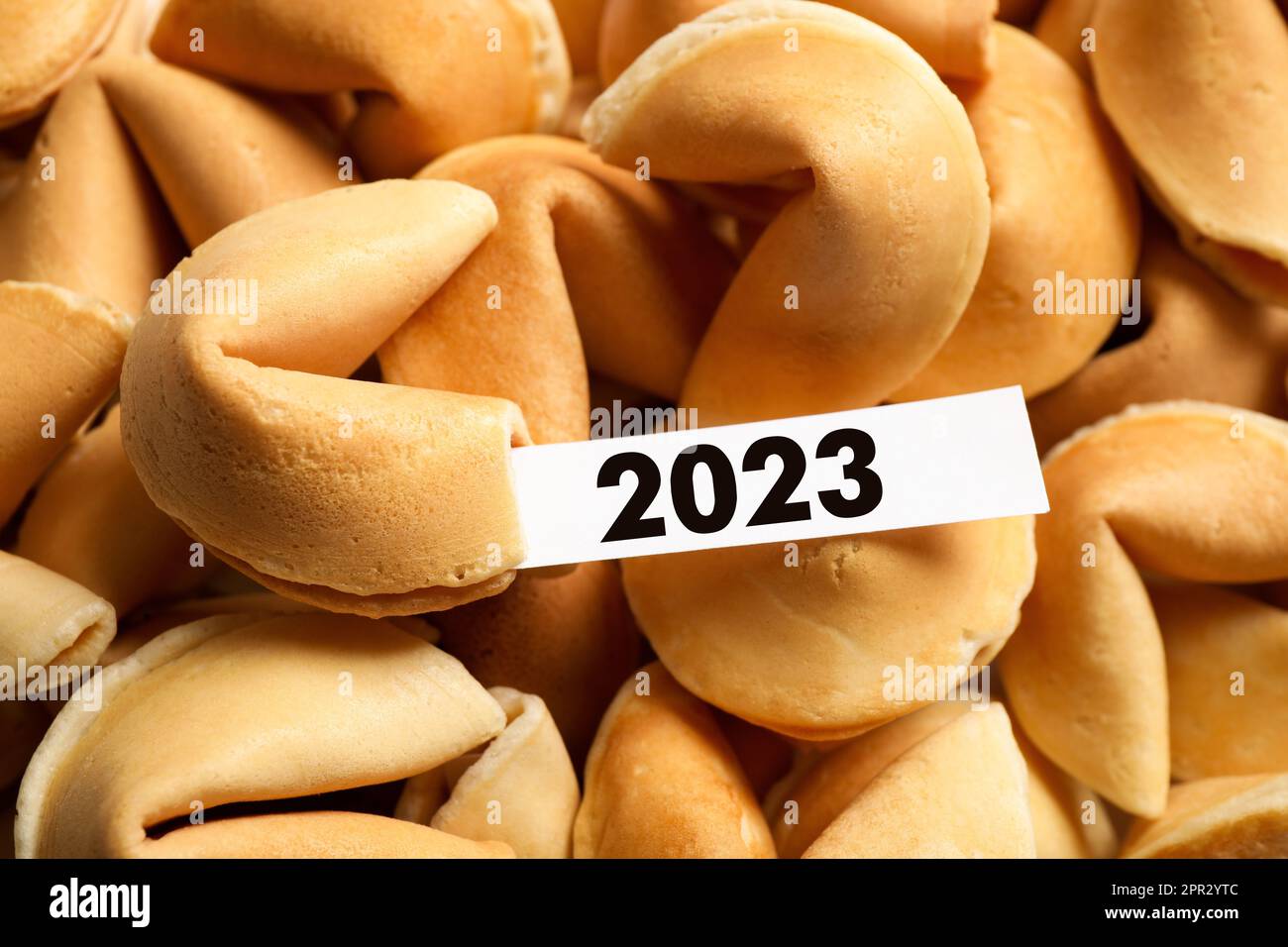 Tasty fortune cookies and paper with number 2023, closeup Stock Photo ...