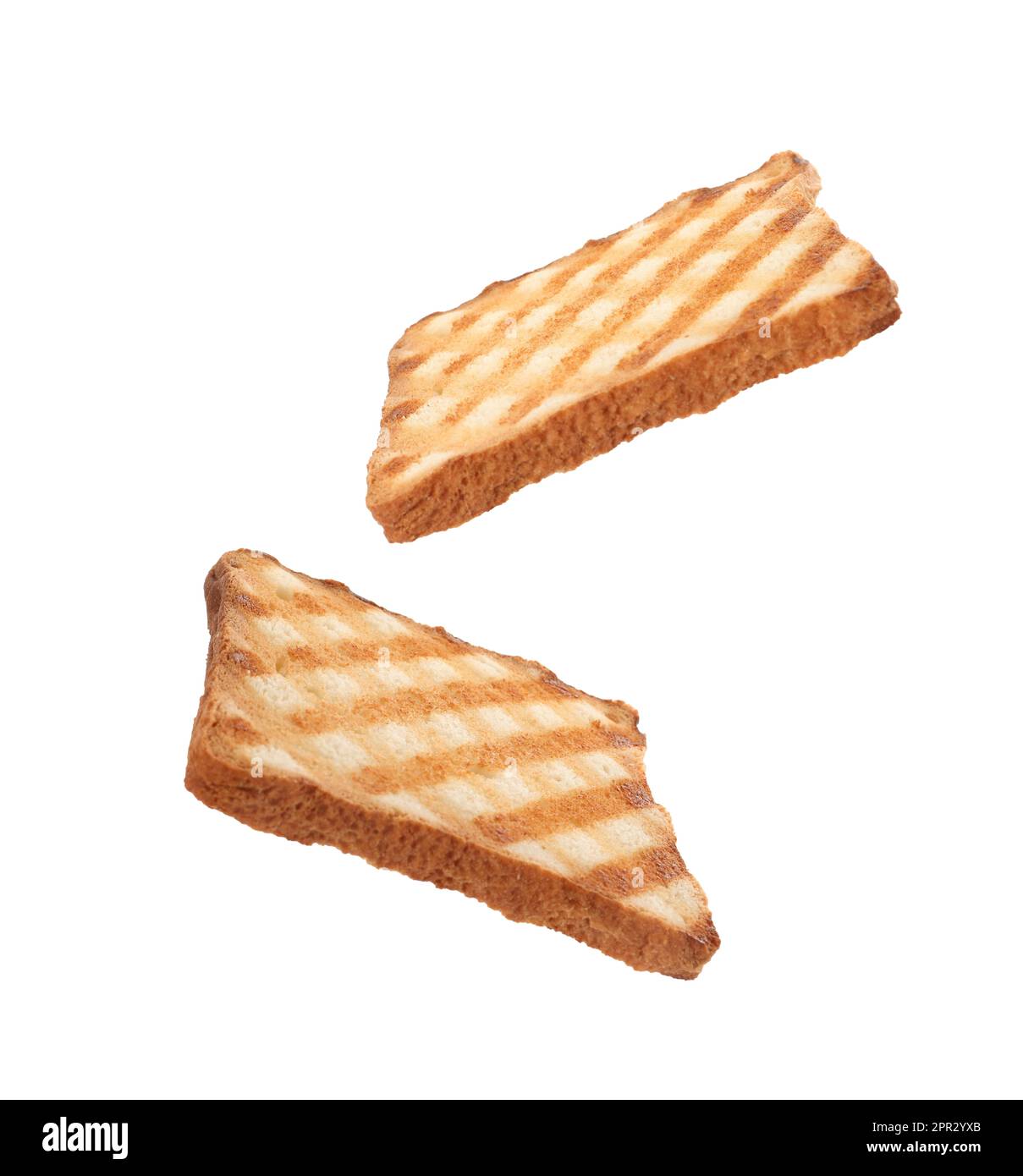 Delicious toasted bread flying on white background Stock Photo - Alamy