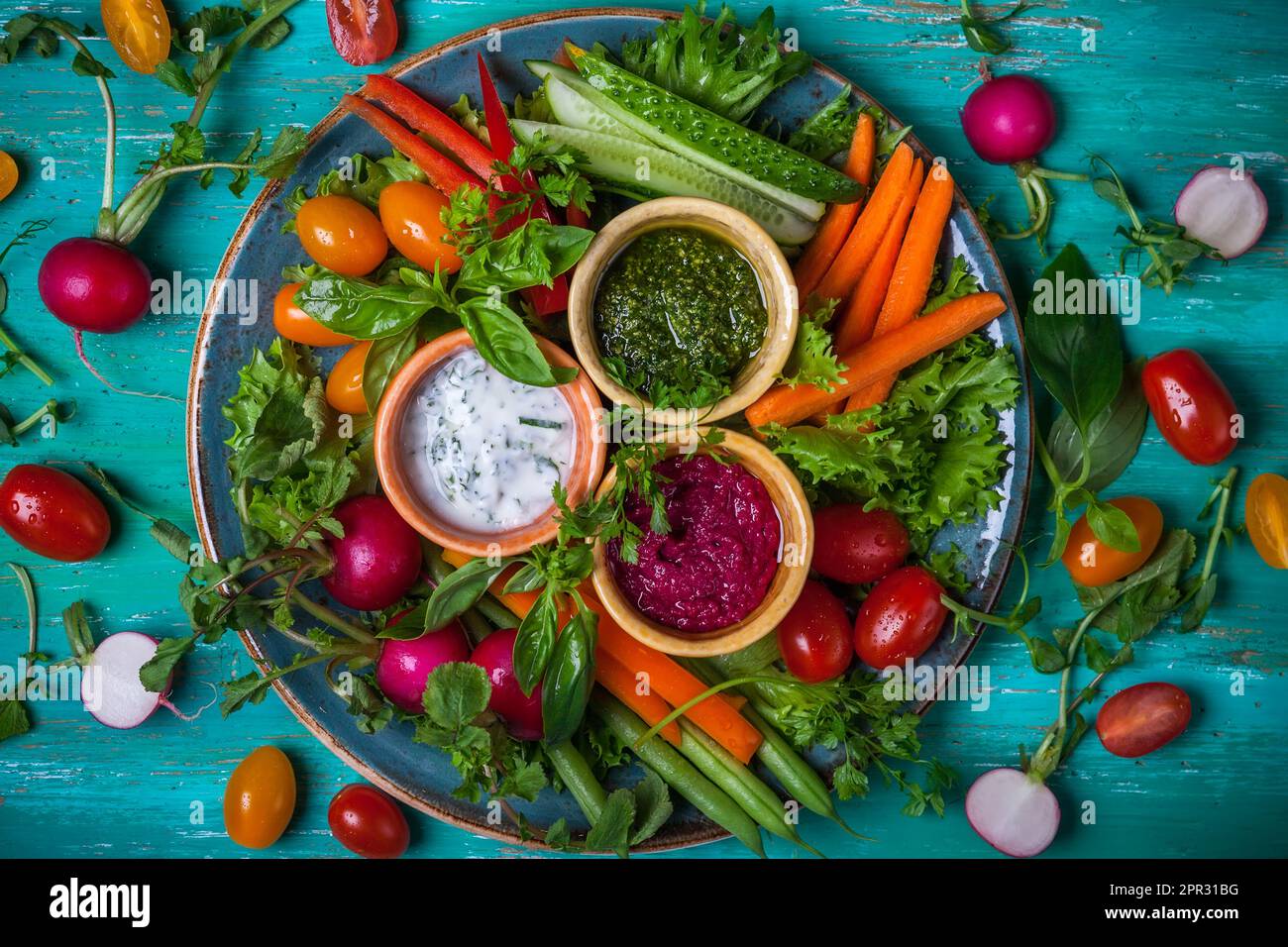 Veggie crudite platter with three different dips Stock Photo - Alamy