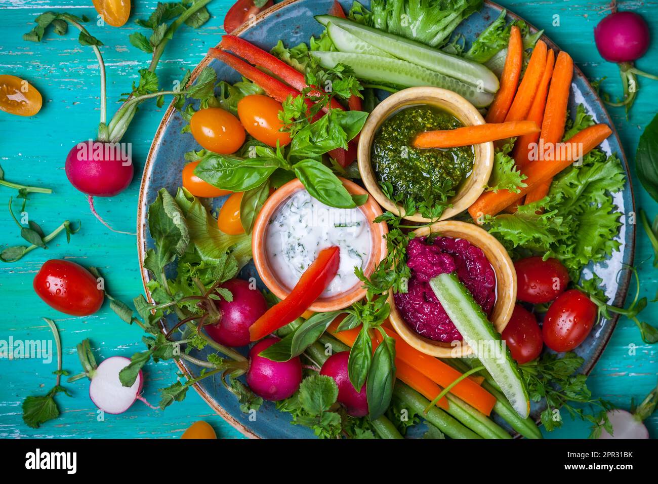 Veggie crudite platter with three different dips Stock Photo - Alamy