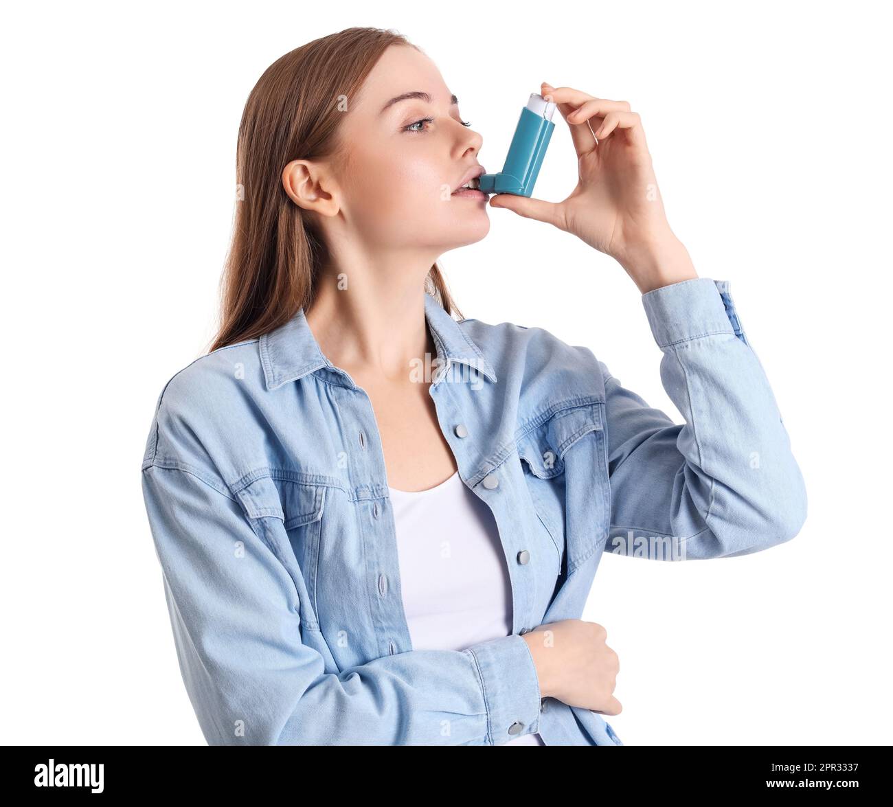 Young woman with inhaler on white background Stock Photo - Alamy