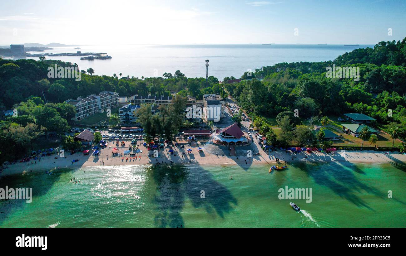 An aerial view of the blue lagoon beach of Port Dickson, with people ...