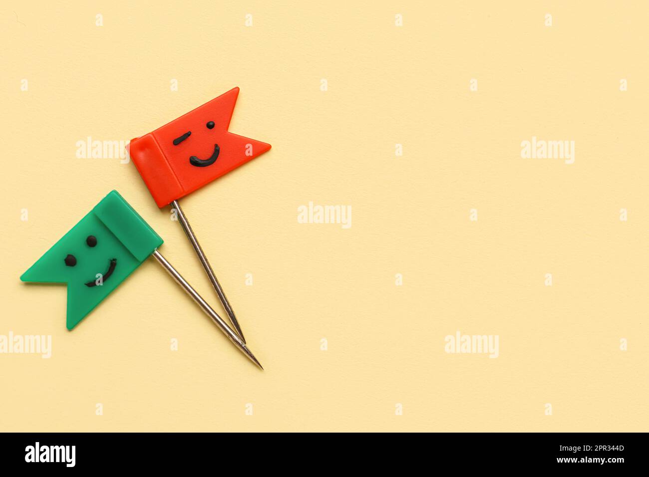 Flags with happy faces on beige background. Friendship Day celebration ...