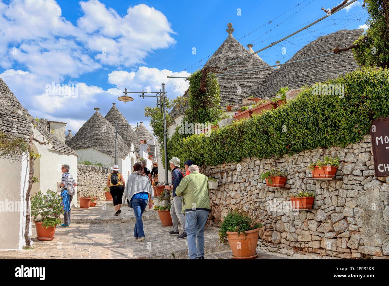 The famous Trulli in the Old Town of Alberobello, Puglia, Italy ...