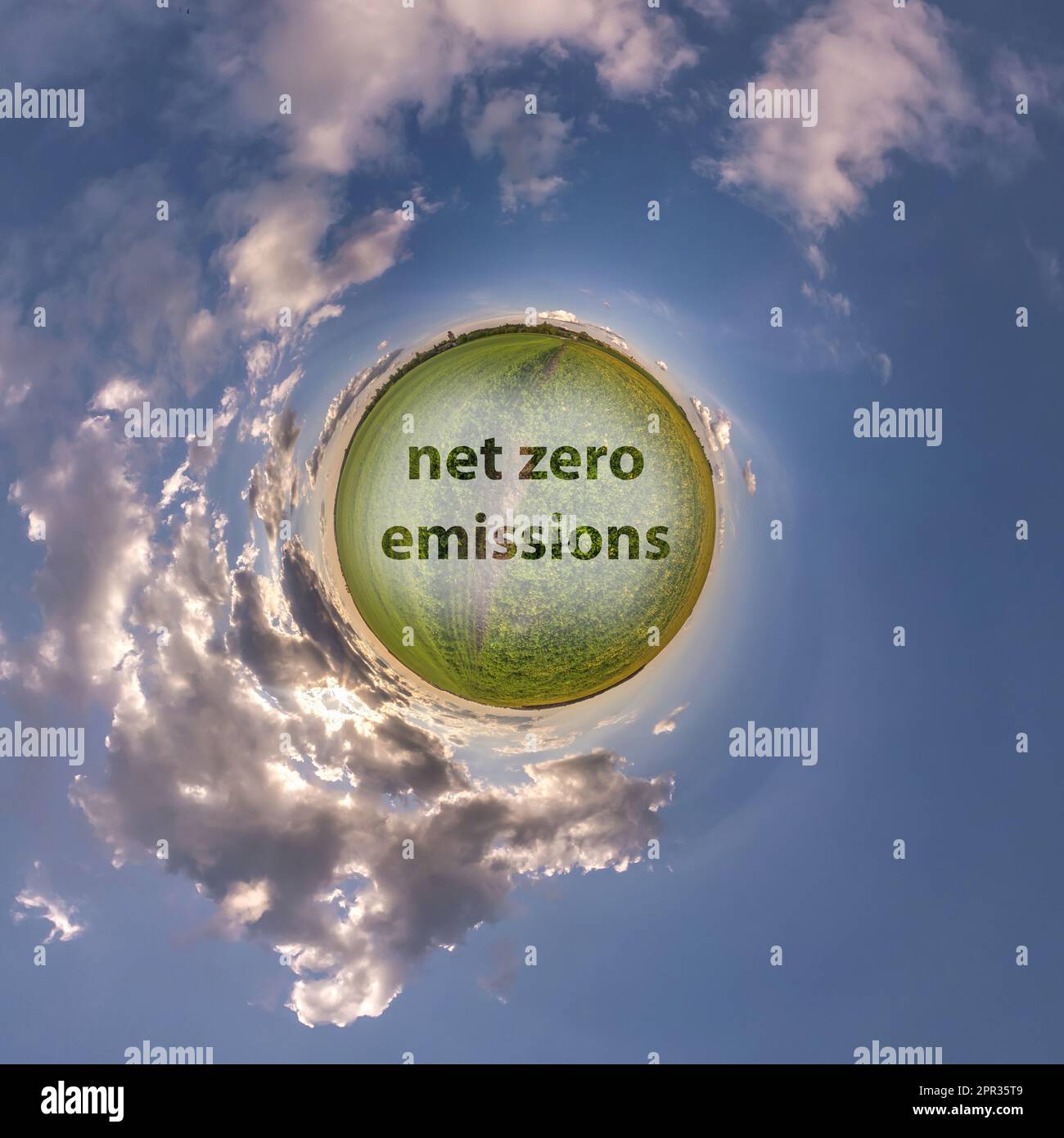 net zero emissions text concept image against blue little planet in ...