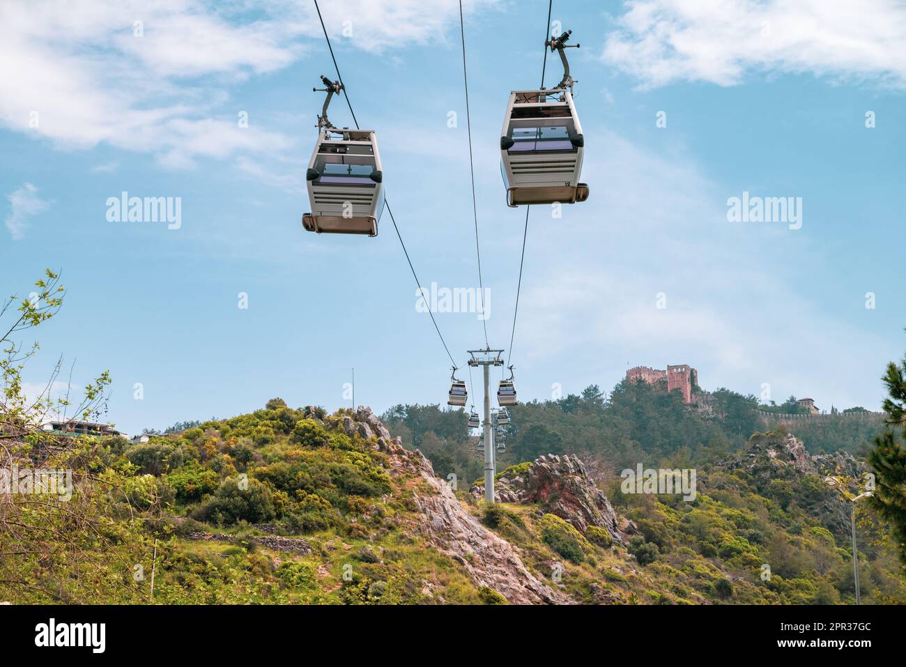 View of Alanya castle and cable car cabins from the cable car cabin ...