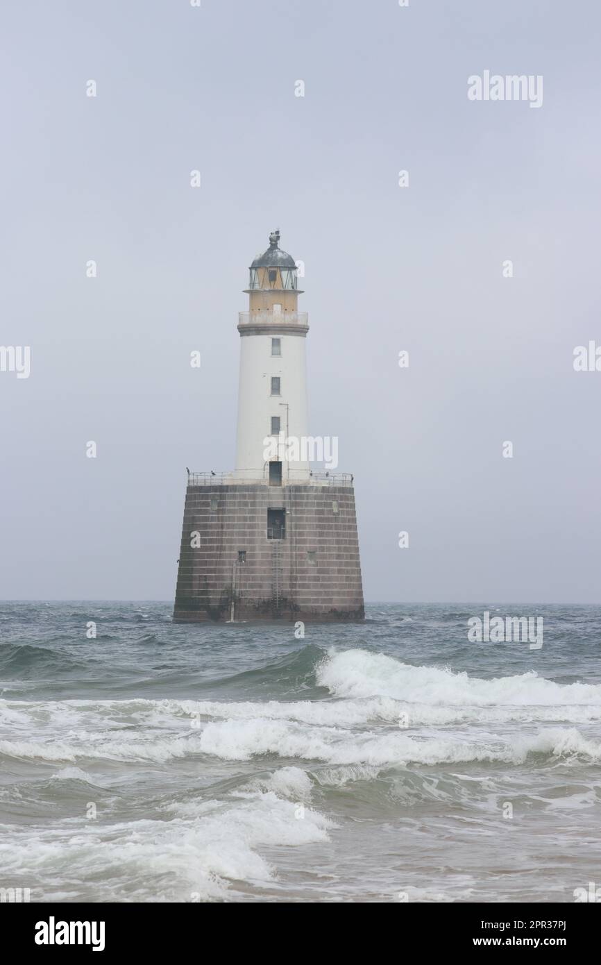 White lighthouse in mist Stock Photo - Alamy
