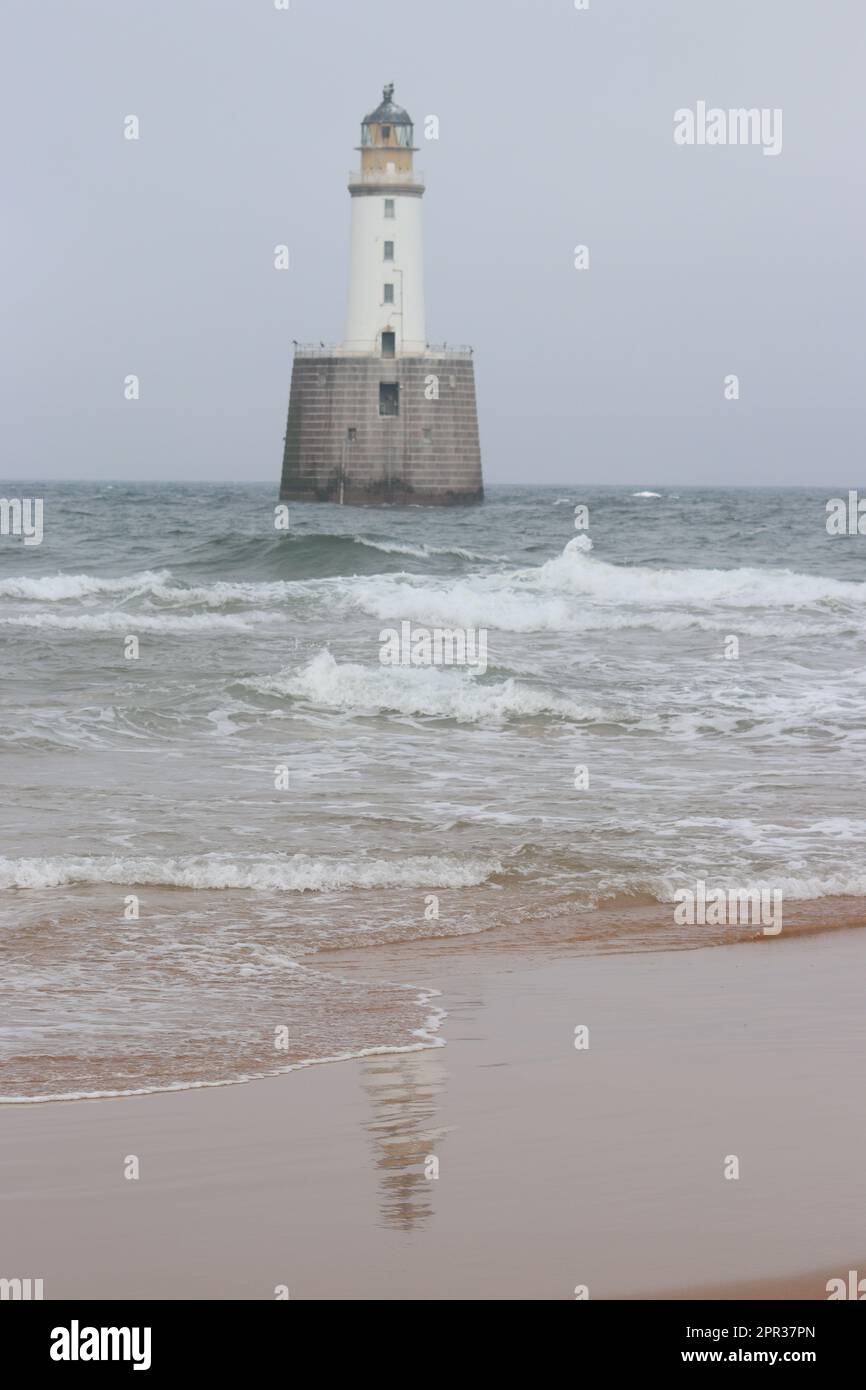 White lighthouse in mist Stock Photo - Alamy