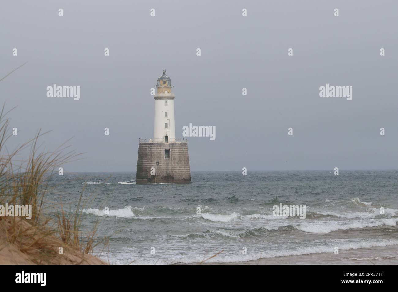 White lighthouse in mist Stock Photo - Alamy