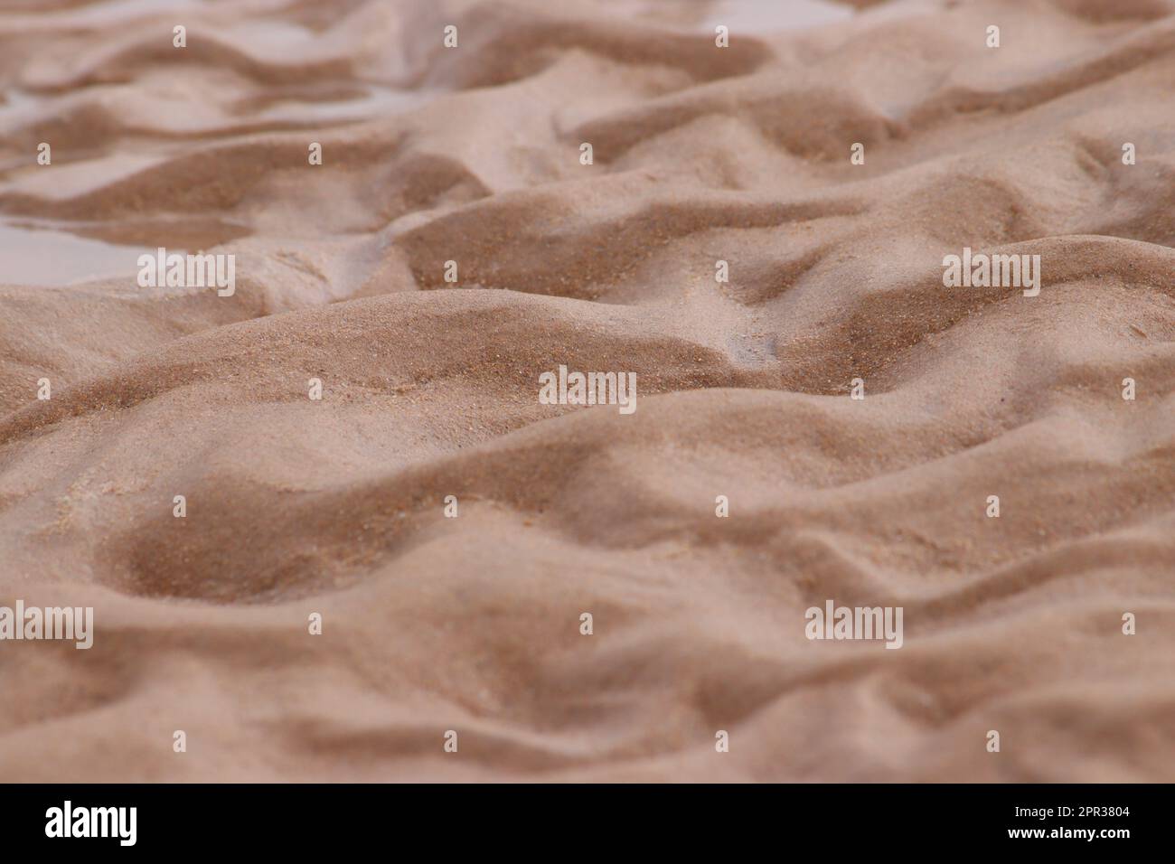 Patterns and textures in sand Stock Photo - Alamy