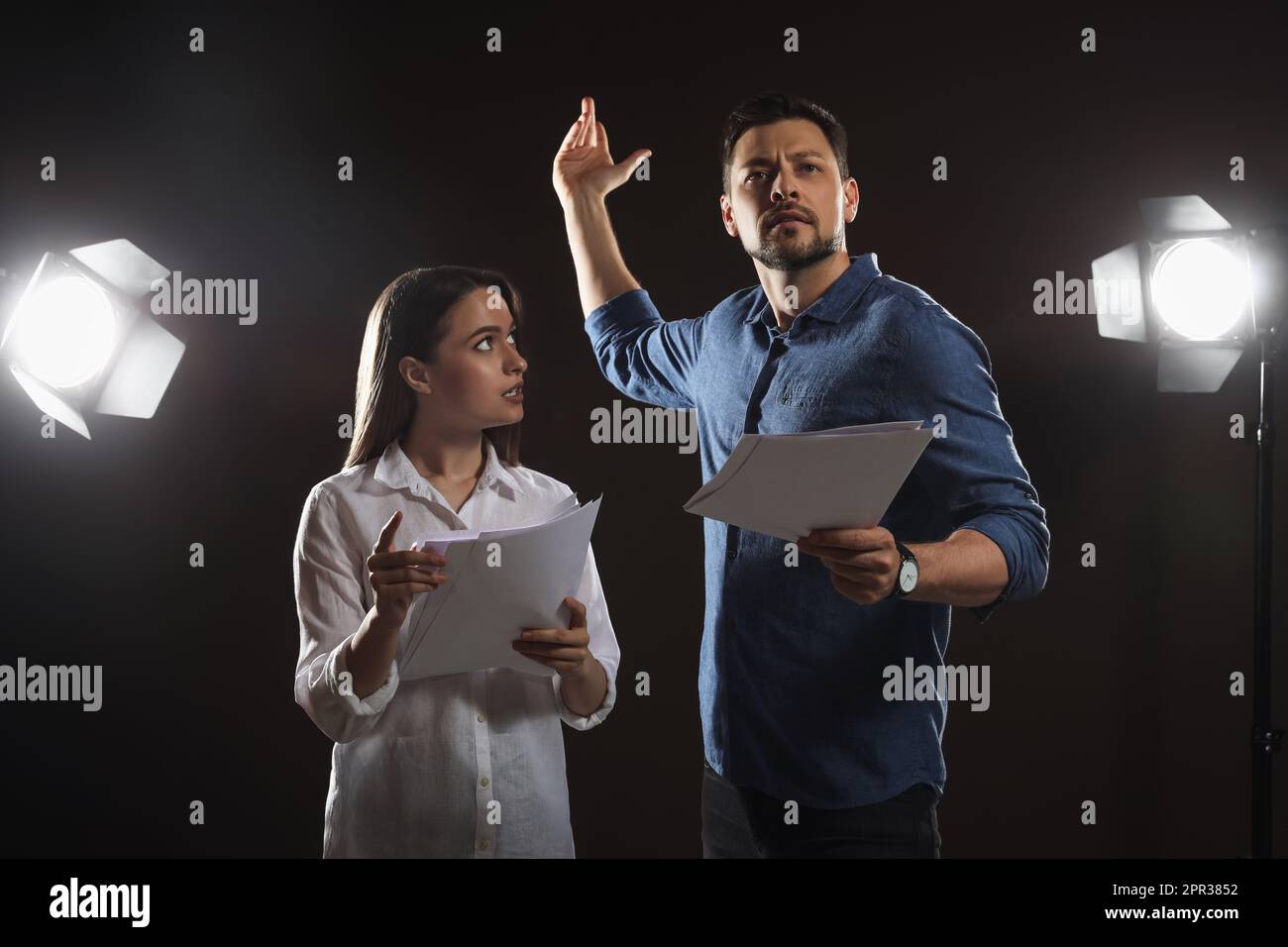 Professional actors rehearsing on stage in theatre Stock Photo - Alamy