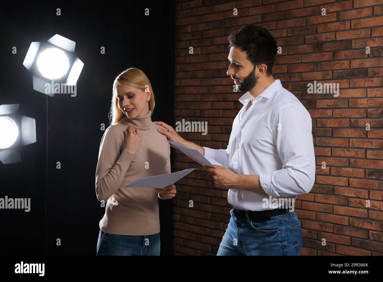 Professional actors rehearsing on stage in theatre Stock Photo - Alamy