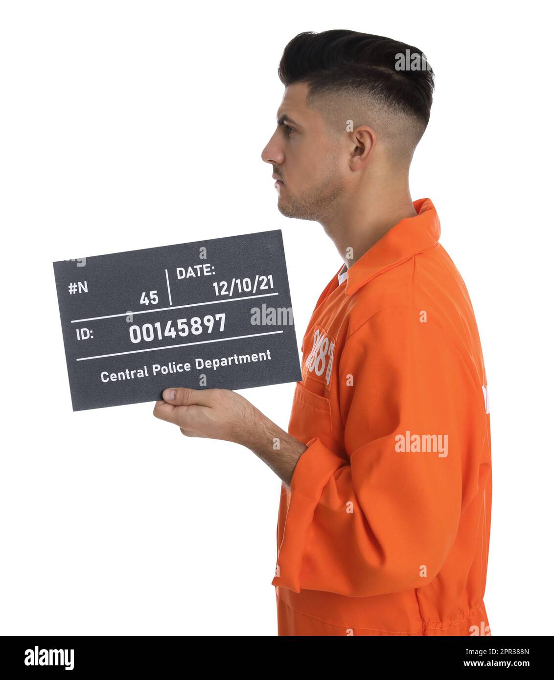 Mug shot of prisoner in orange jumpsuit with board on white background ...