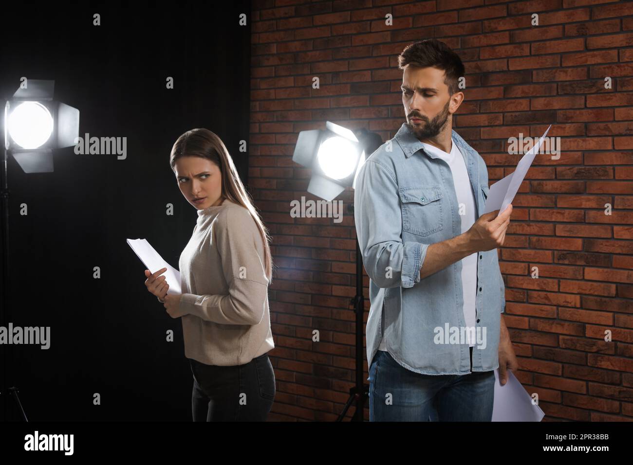 Professional actors rehearsing on stage in theatre Stock Photo - Alamy