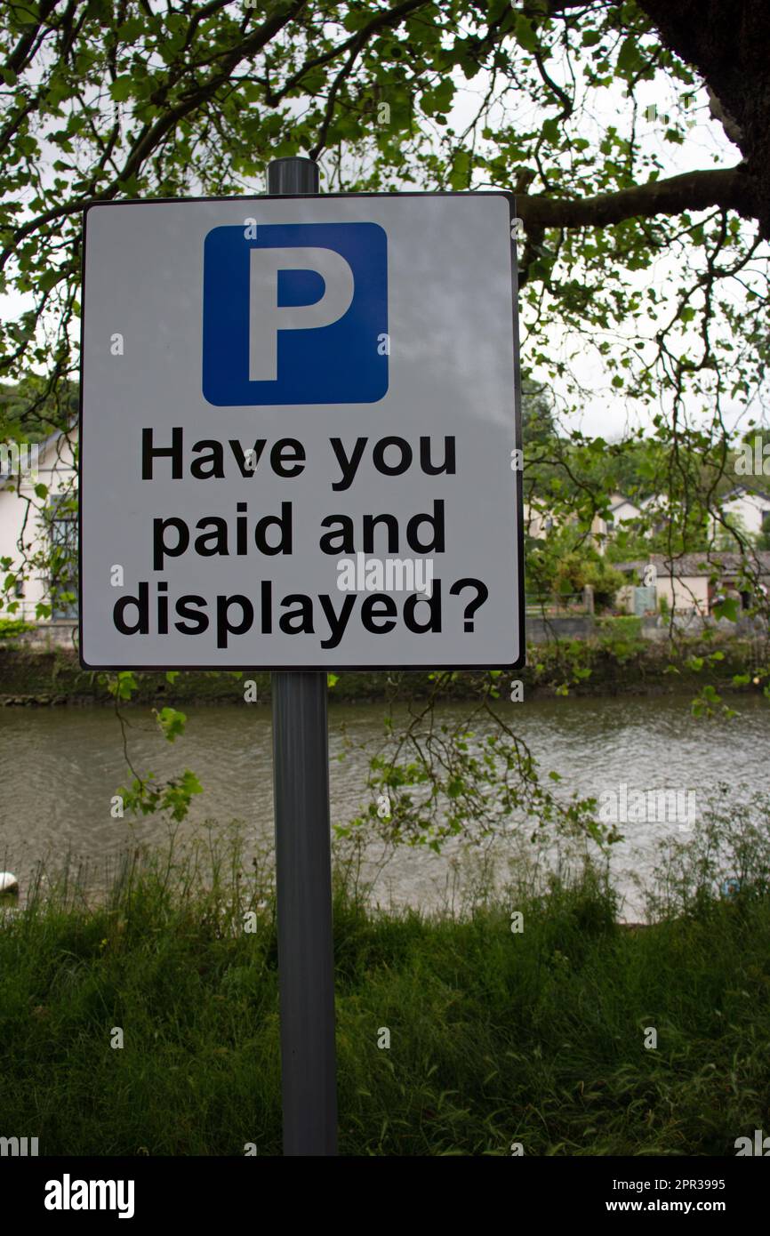 Have you paid and displayed sign with black letters on a white ...