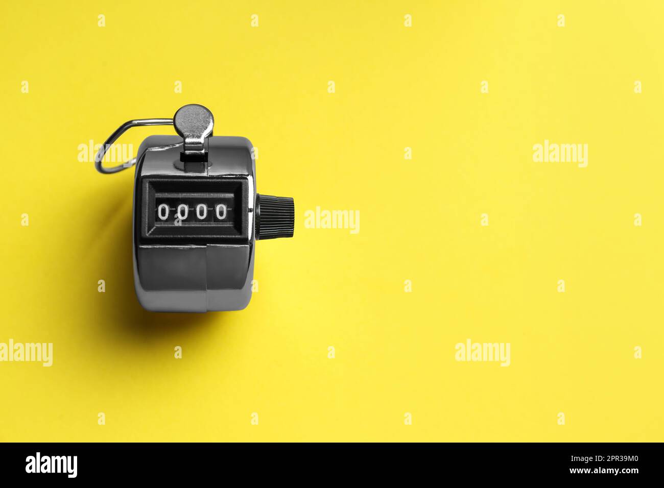 Modern timer on yellow background, top view. Space for text Stock Photo ...