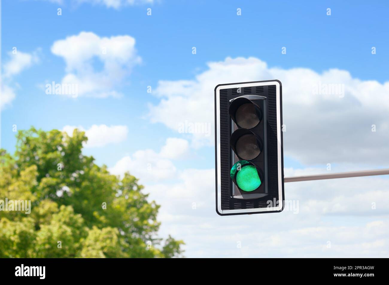 Traffic light against blue sky, space for text Stock Photo - Alamy