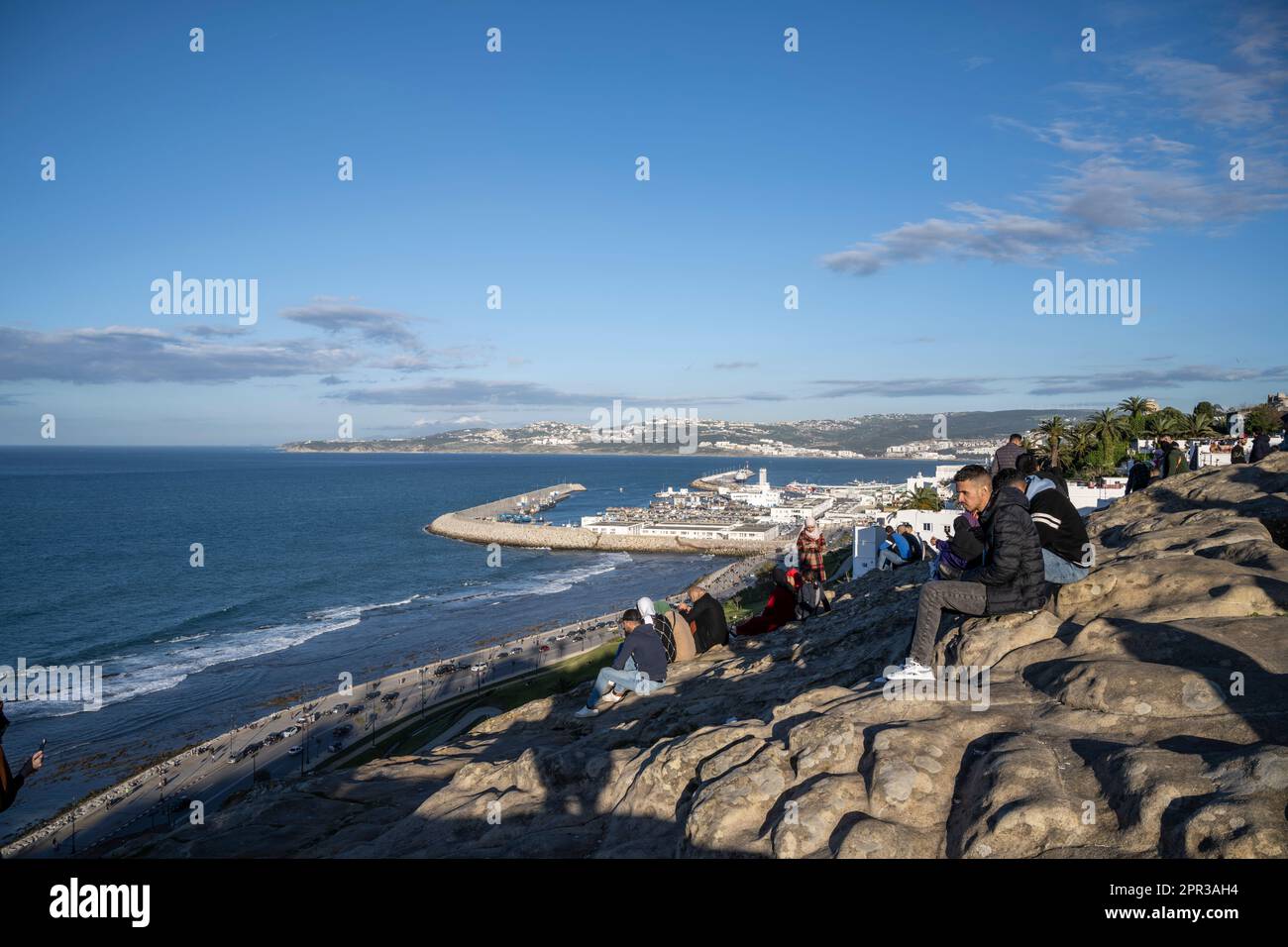 People watching the sunset from the top of the Kasbah of Tangier with ...