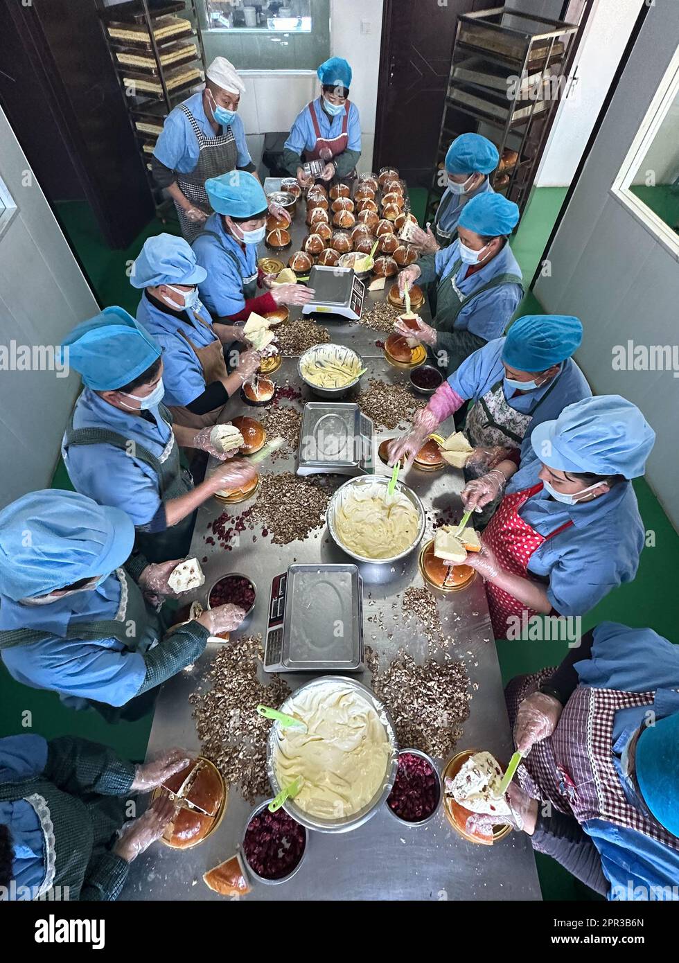 (230426) -- TACHENG, April 26, 2023 (Xinhua) -- Employees make Tacheng ...