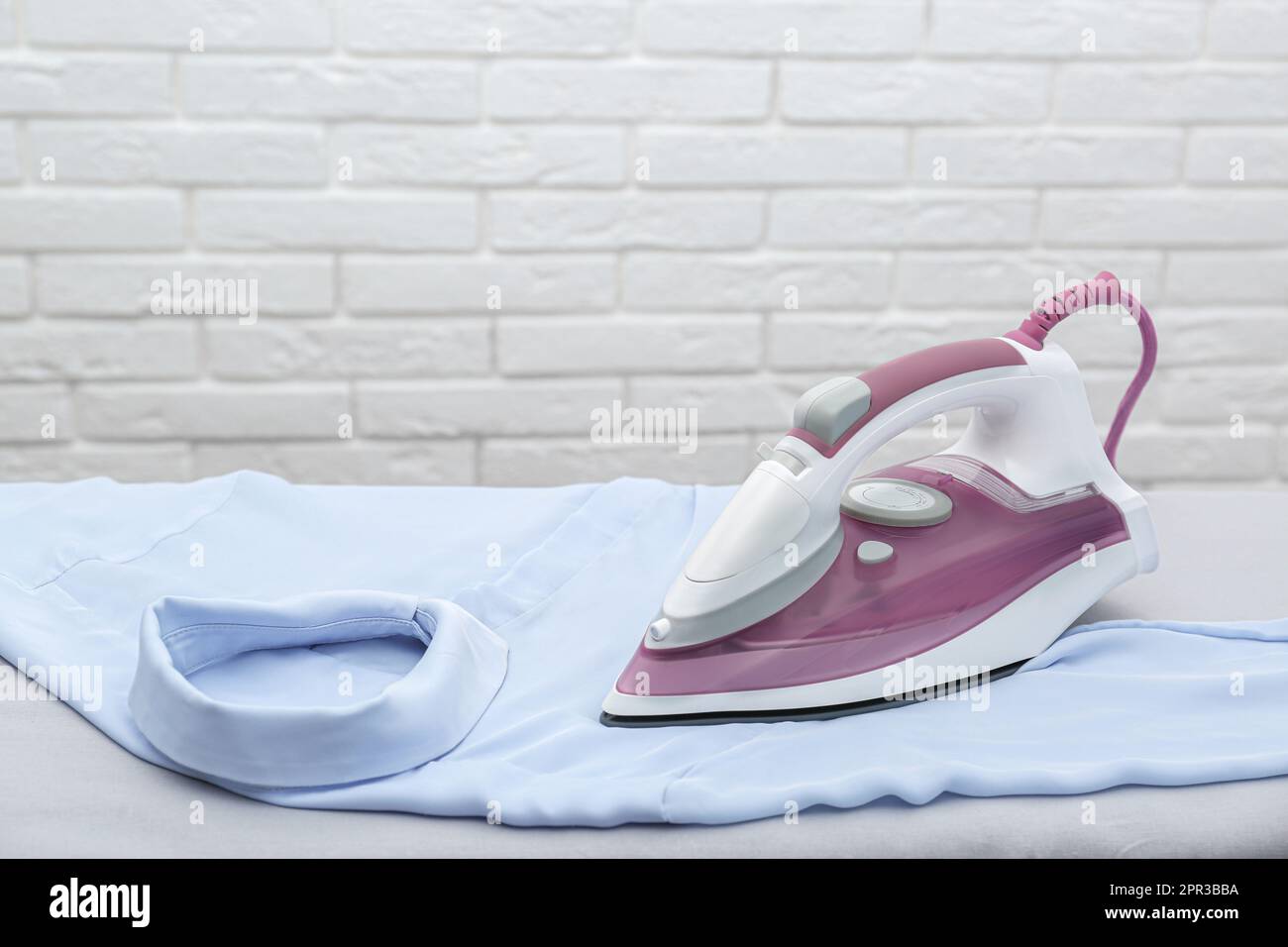 Ironing board against white hi-res stock photography and images - Alamy