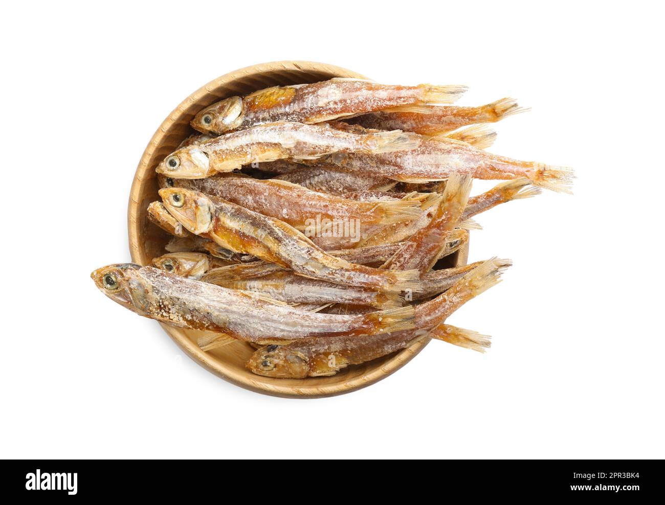 Delicious dried salted anchovies on white background, top view Stock ...