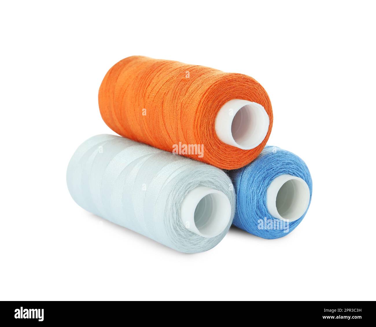 Different colorful sewing threads on white background Stock Photo - Alamy