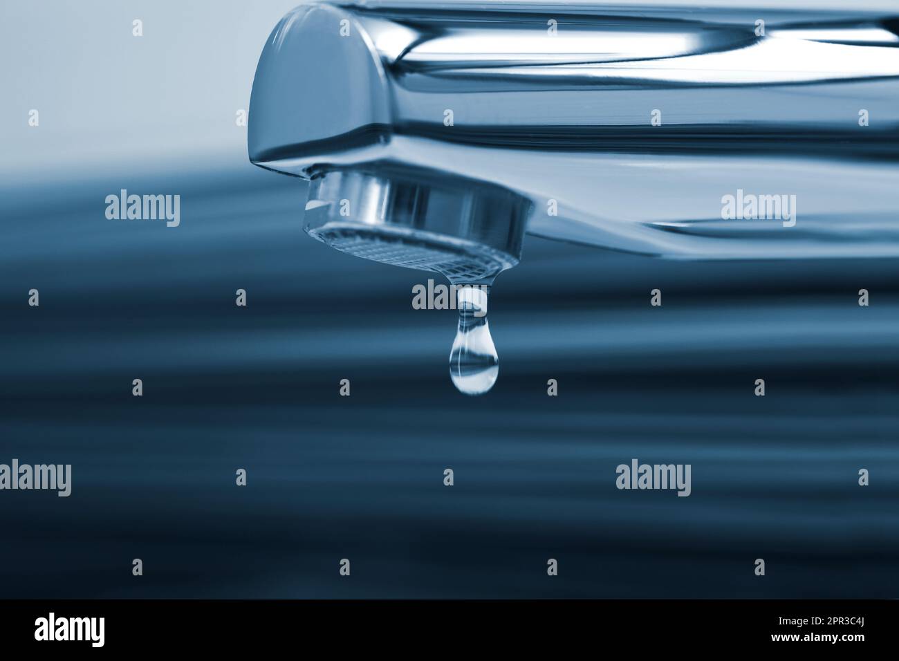 Water drop falling from tap hi-res stock photography and images - Alamy