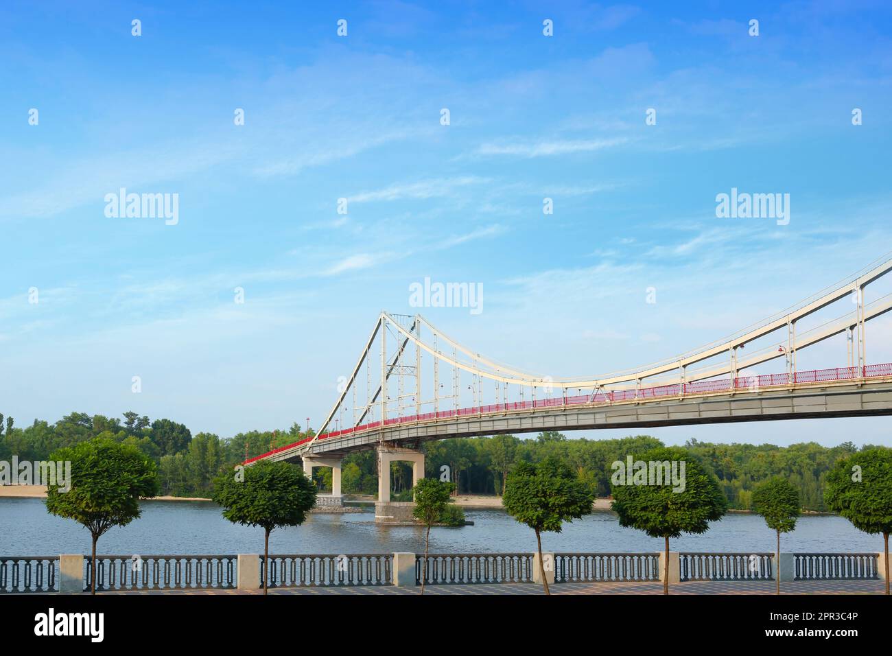 Beautiful cityscape with modern bridge over river Stock Photo - Alamy