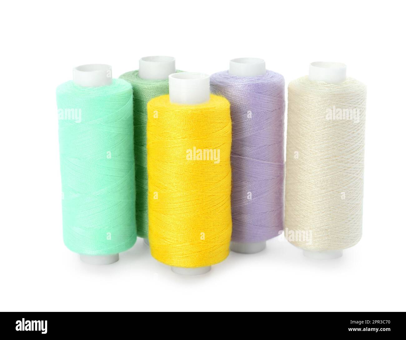 Set of different colorful sewing threads on white background Stock ...