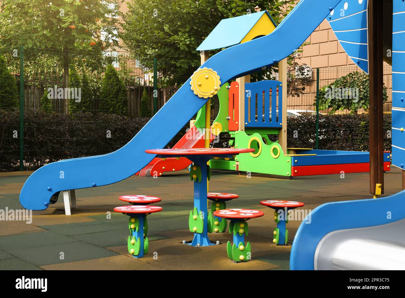 Outdoor playground for children with funny colorful table, chairs and ...