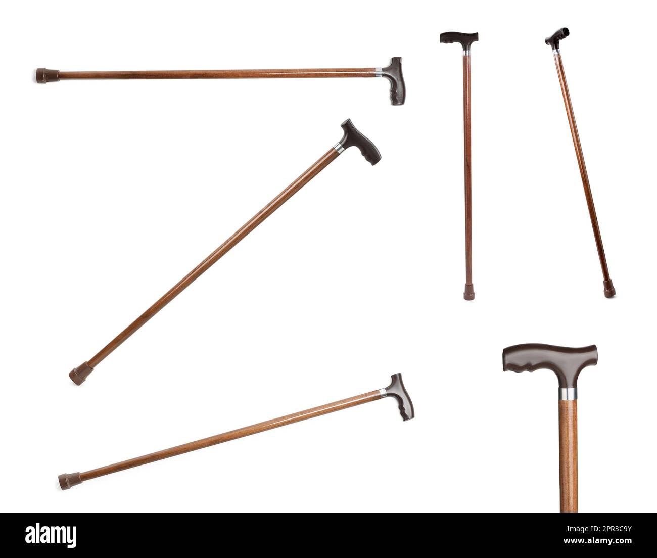 Set with elegant wooden walking canes on white background Stock Photo ...